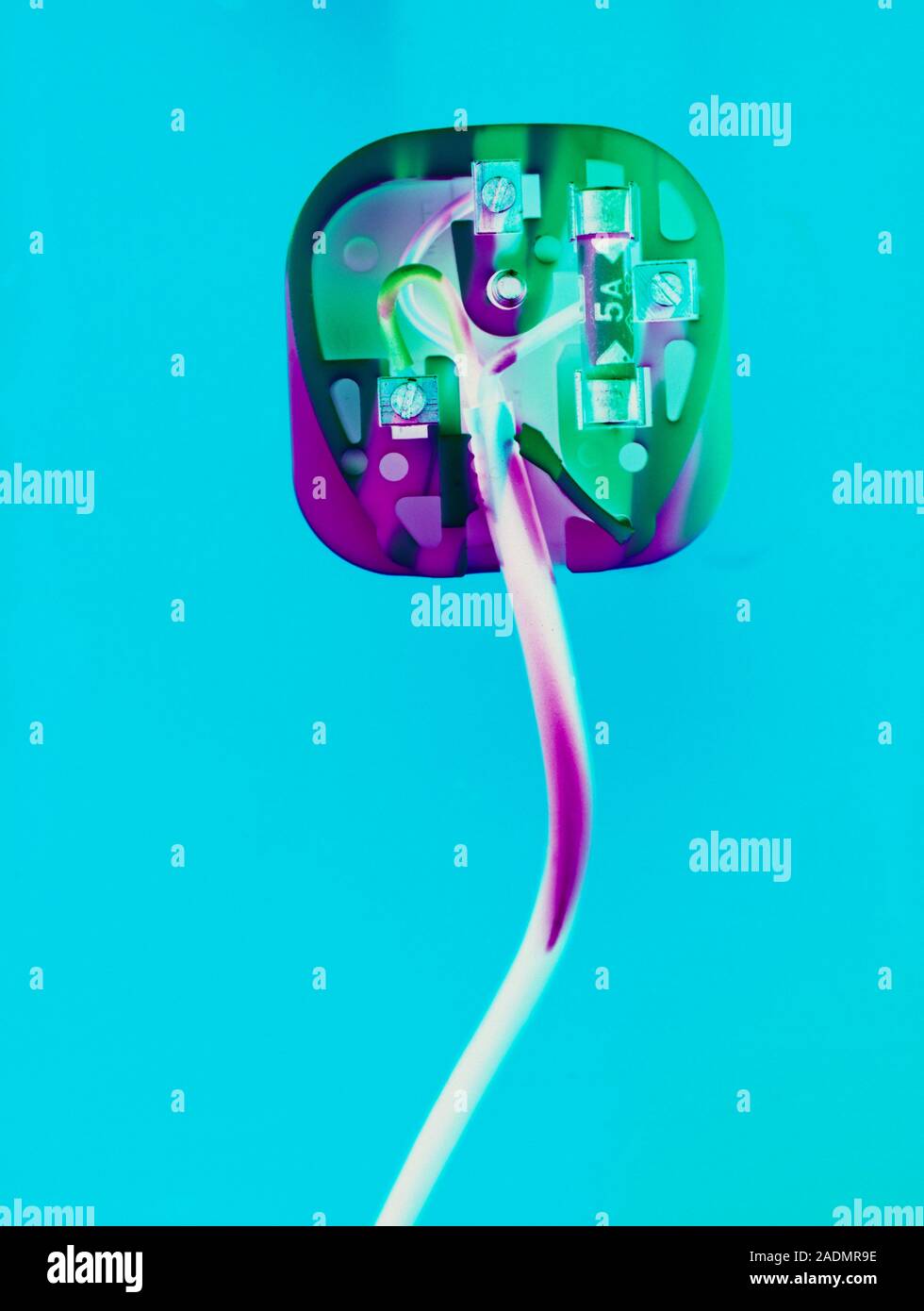 Electric plug opened to show the internal wiring. The live wire is ...