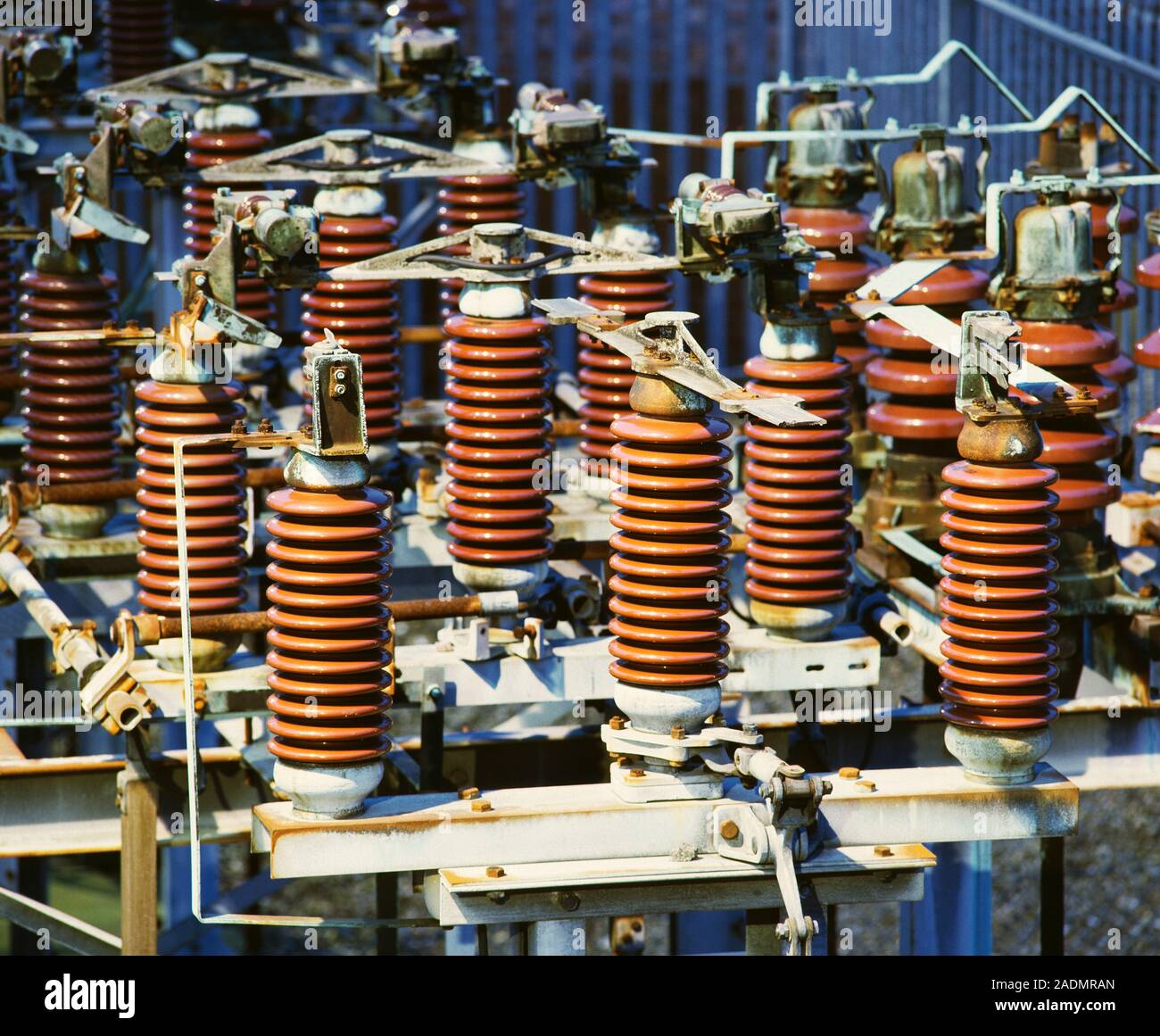 Electricity substation. Ceramic insulators on a transformer at an ...