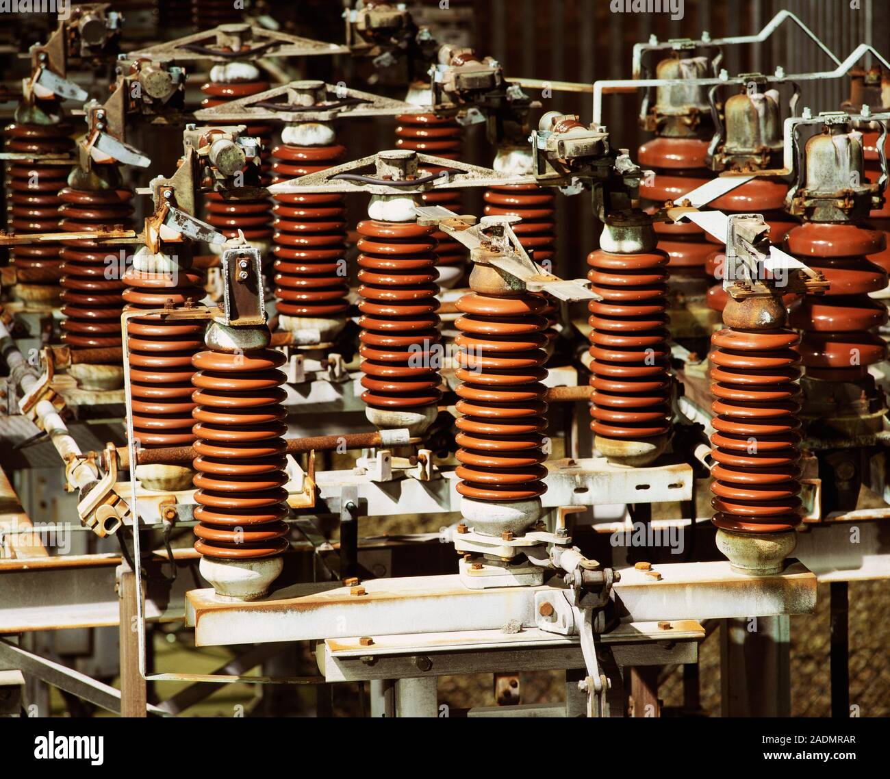 Electricity substation. Ceramic insulators on a transformer at an ...