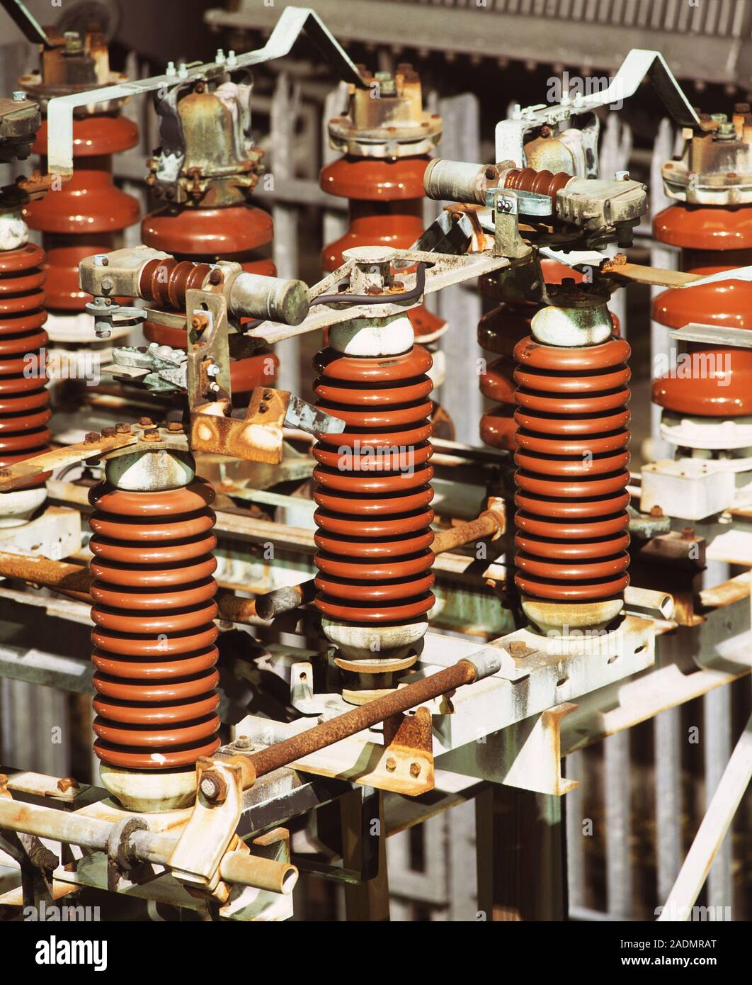 Electricity substation. Ceramic insulators on a transformer at an ...