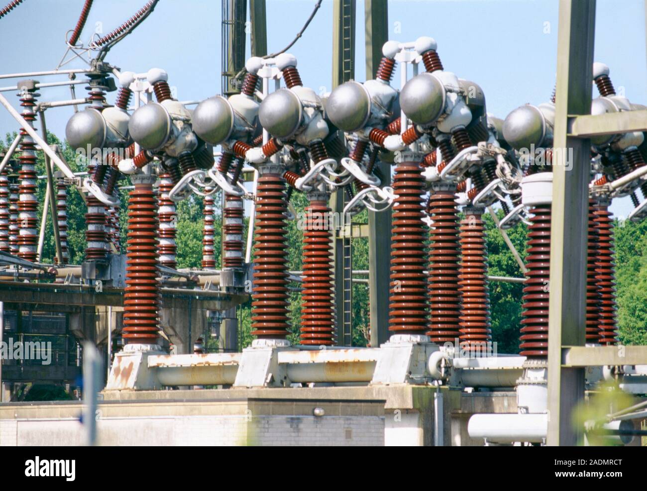 Ceramic insulators at an electricity substation in Sussex, UK Stock ...
