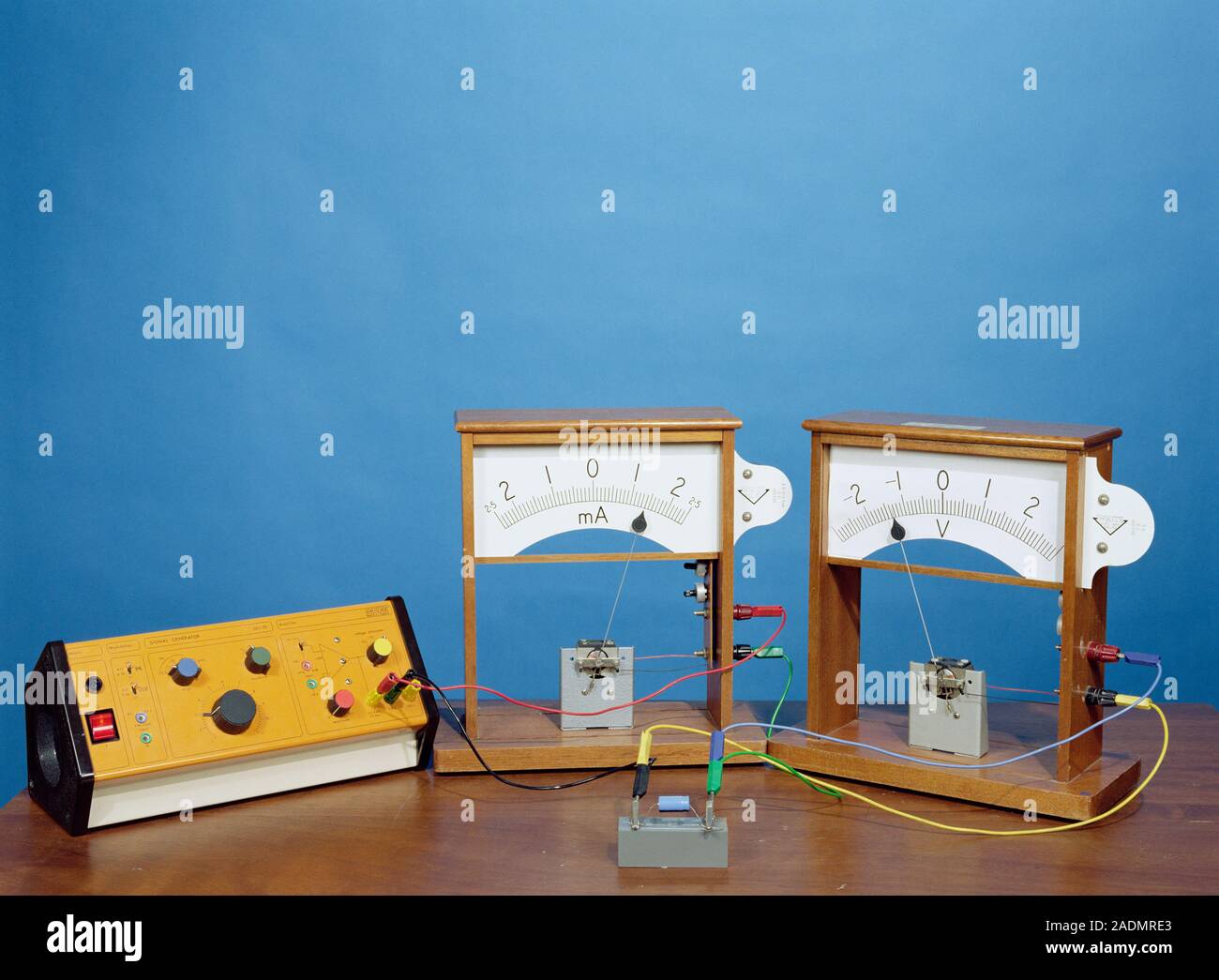 Electric circuit. Capacitor (blue, lower centre) connected to an ...