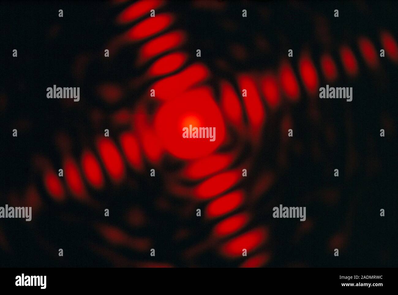 Neon laser diffraction pattern Stock Photo - Alamy
