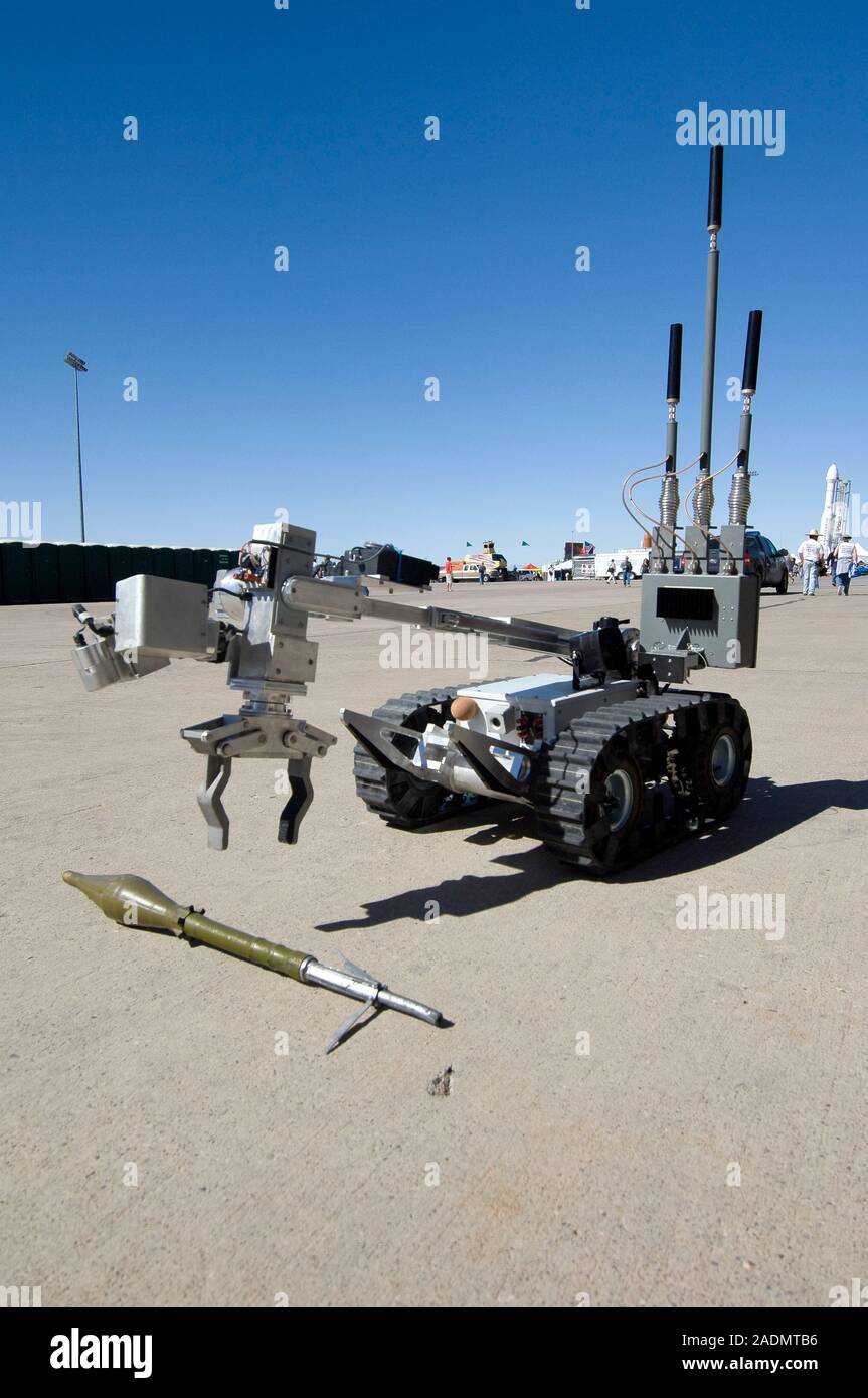 Bomb disposal robot. The Remotec HD-1 robot preparing to pick up an ...