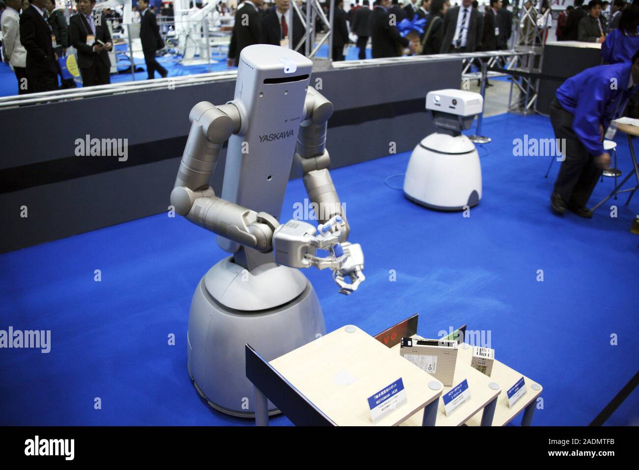 Domestic service robots. At left is a SmartPal robot from the Yaskawa Electric Corporation ...
