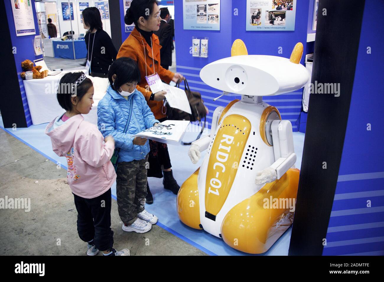 Domestic service robot with a mother and children. This is the RIDC-01 ...