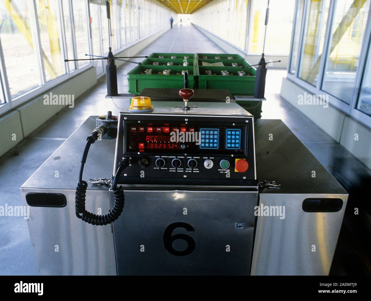 Factory robot. Automated guided vehicle (AGV) carrying materials to the ...