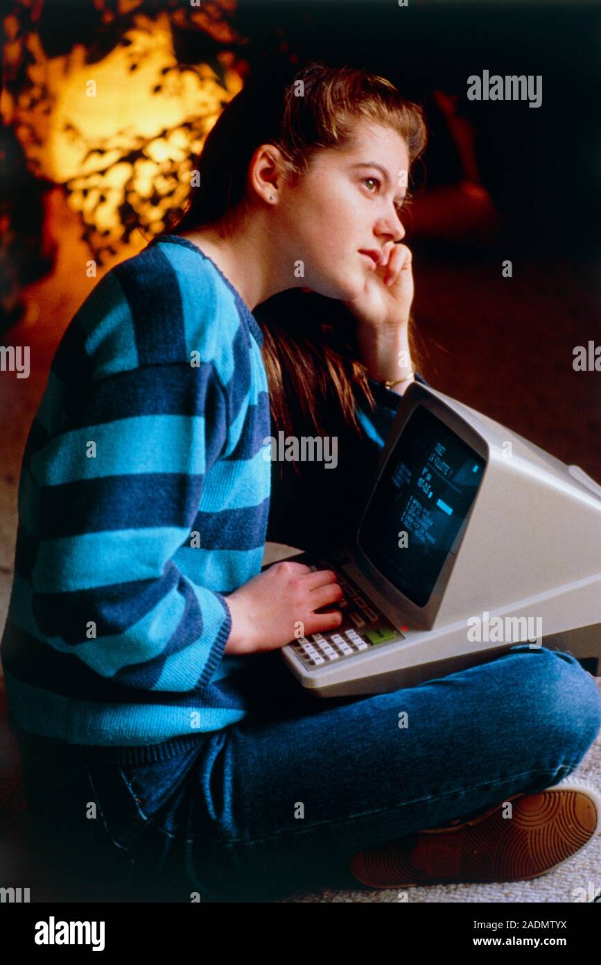 Teenager using Minitel, the French computer terminal telephone ...