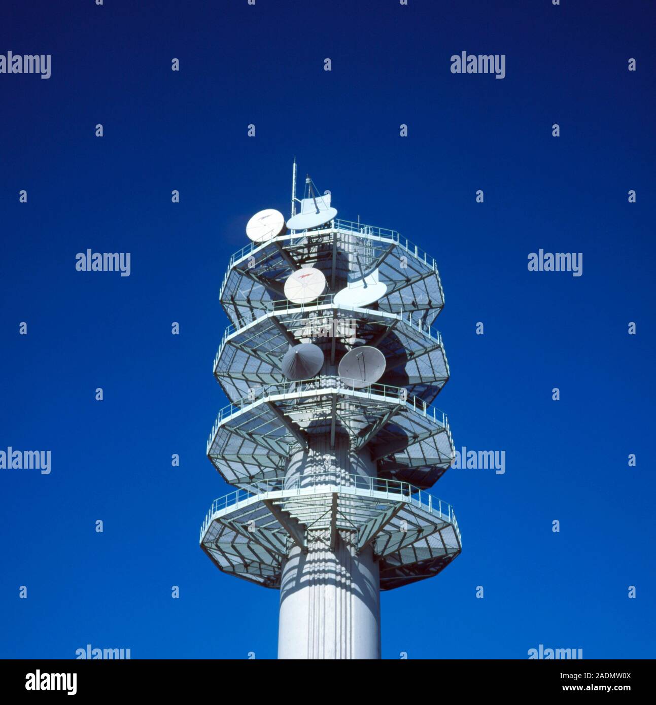 Telecommunications tower. Microwave transmissions relay tower with an ...