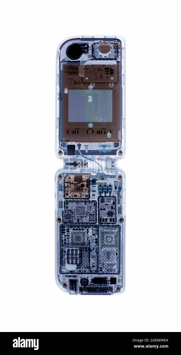 Mobile phone, coloured X-ray Stock Photo - Alamy