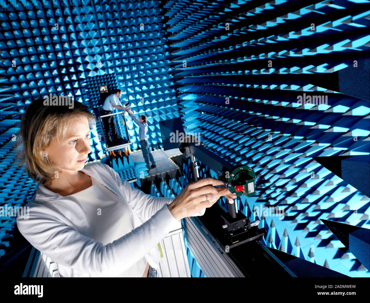 Testing an antenna. Researchers setting up an antenna to be calibrated ...