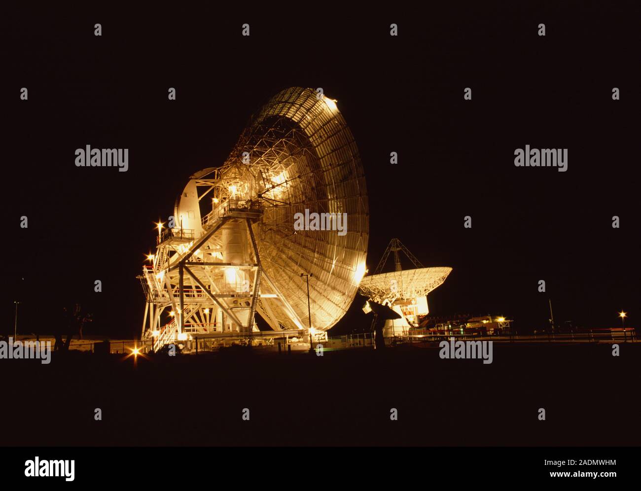 Goldstone radio antennas. Night-time view of two of the dish antennas ...
