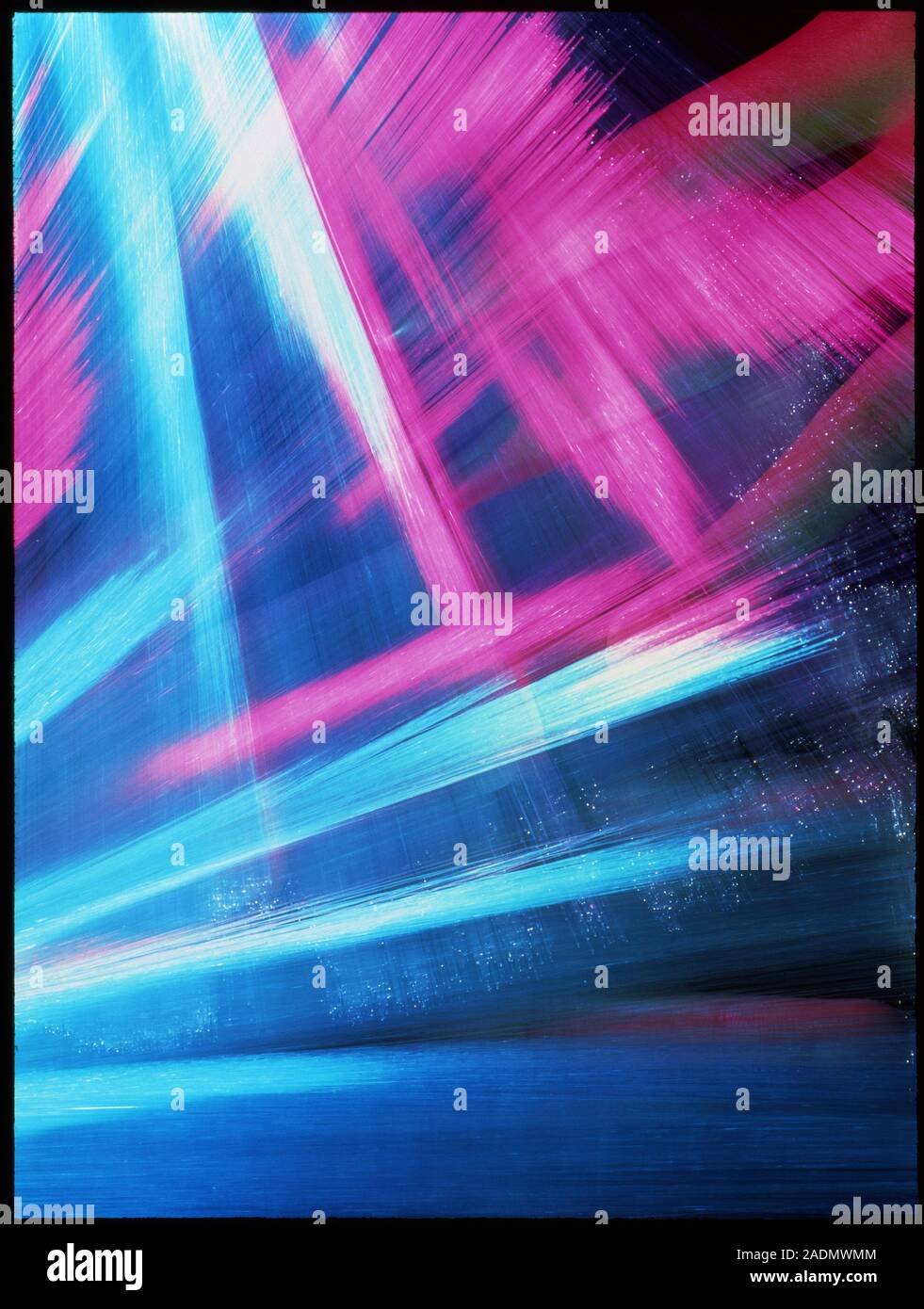 Fibre optics. Fingers weave through optical fibres which are conducting ...