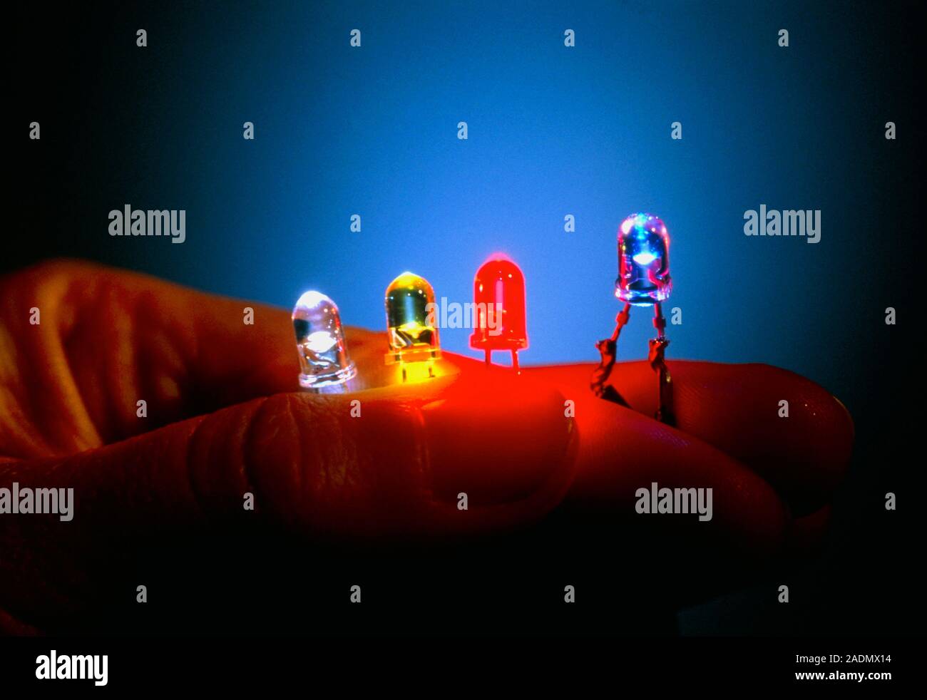 Blue diode. View of a hand holding the worlds first marketed blue light ...