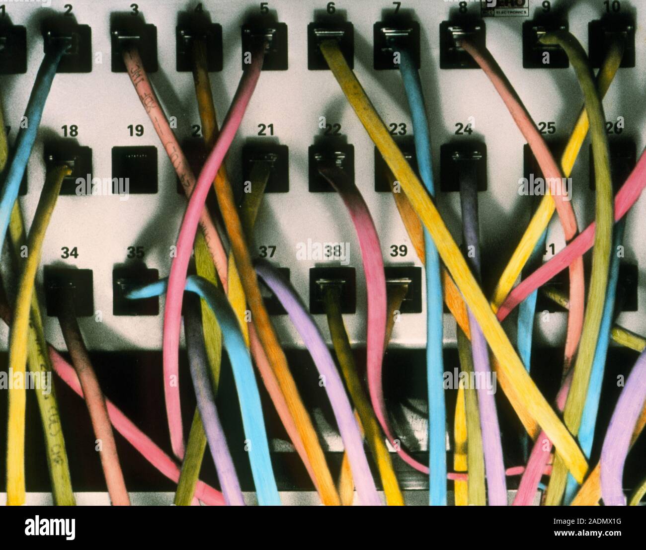 Patch panel. Computer patch panel or board to which several coloured ...