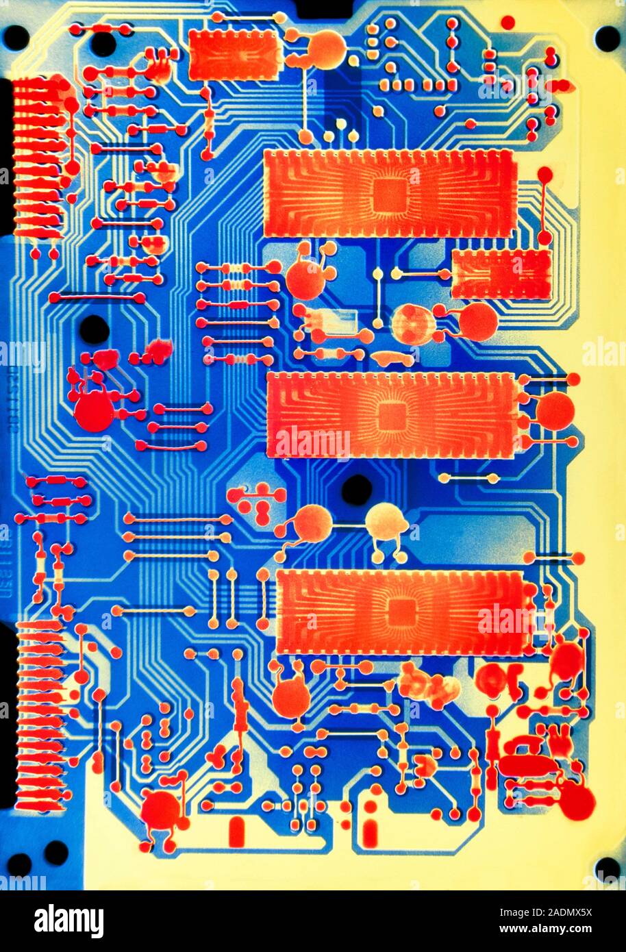 Circuit board. Coloured high-resolution X-ray of a circuit board ...