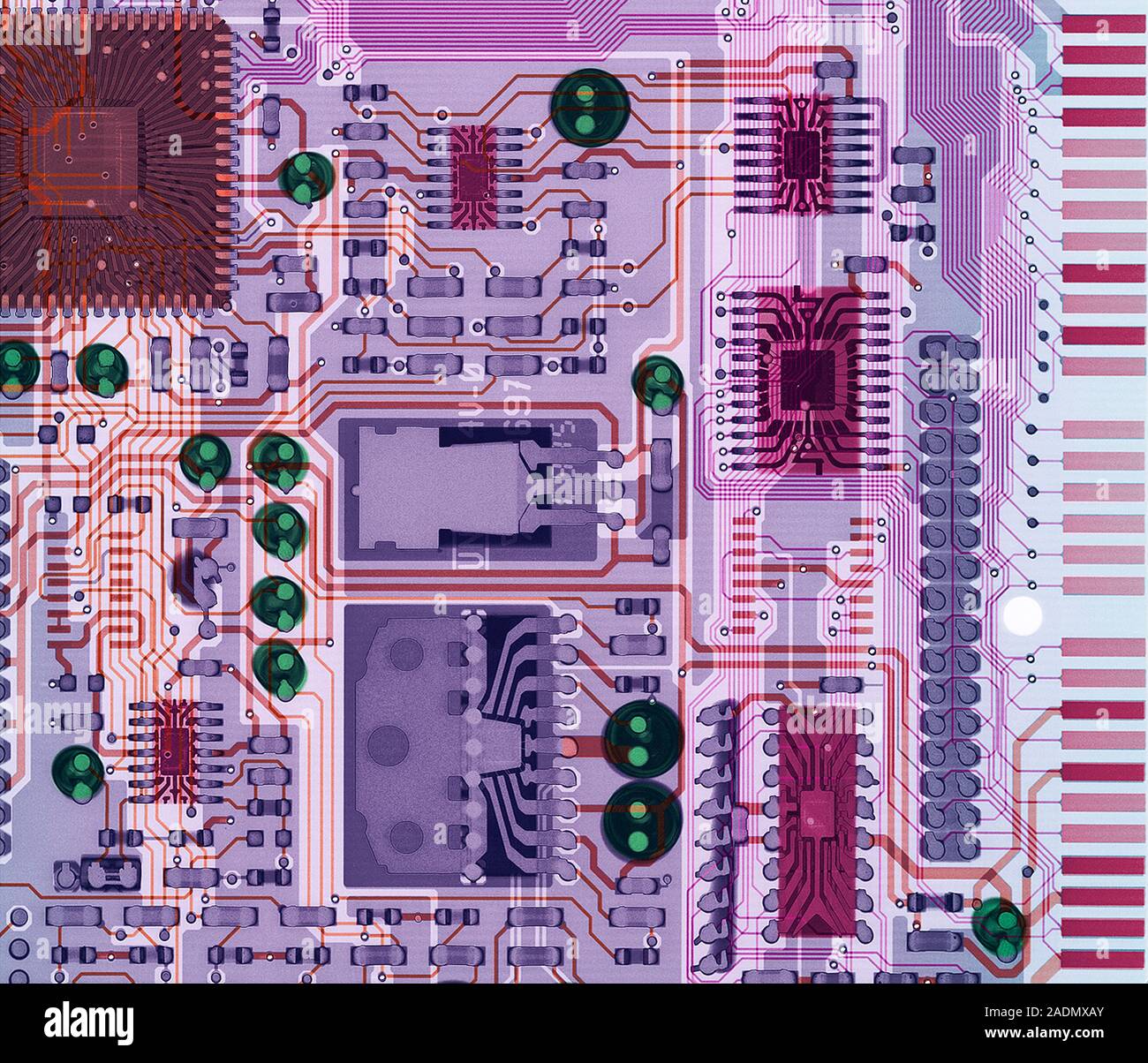 Sound card. Coloured X-ray of part of a sound card (or sound board), a ...