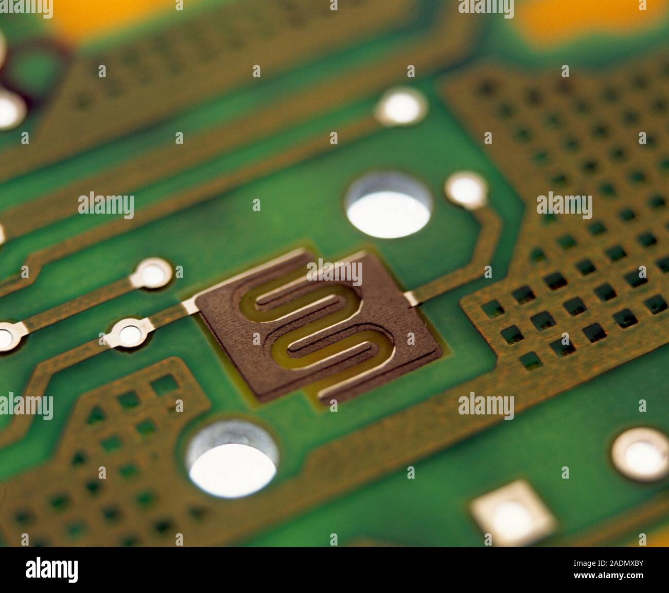 Circuit board. Surface of a printed circuit board (PCB). It consists of ...