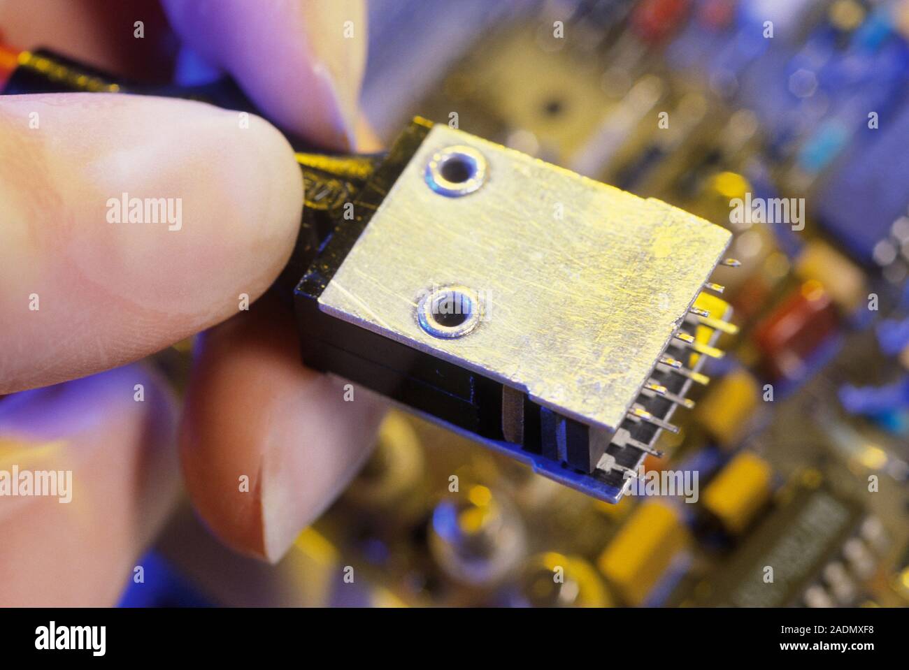 Electrical connector held in a hand. This connector is used in aviation ...