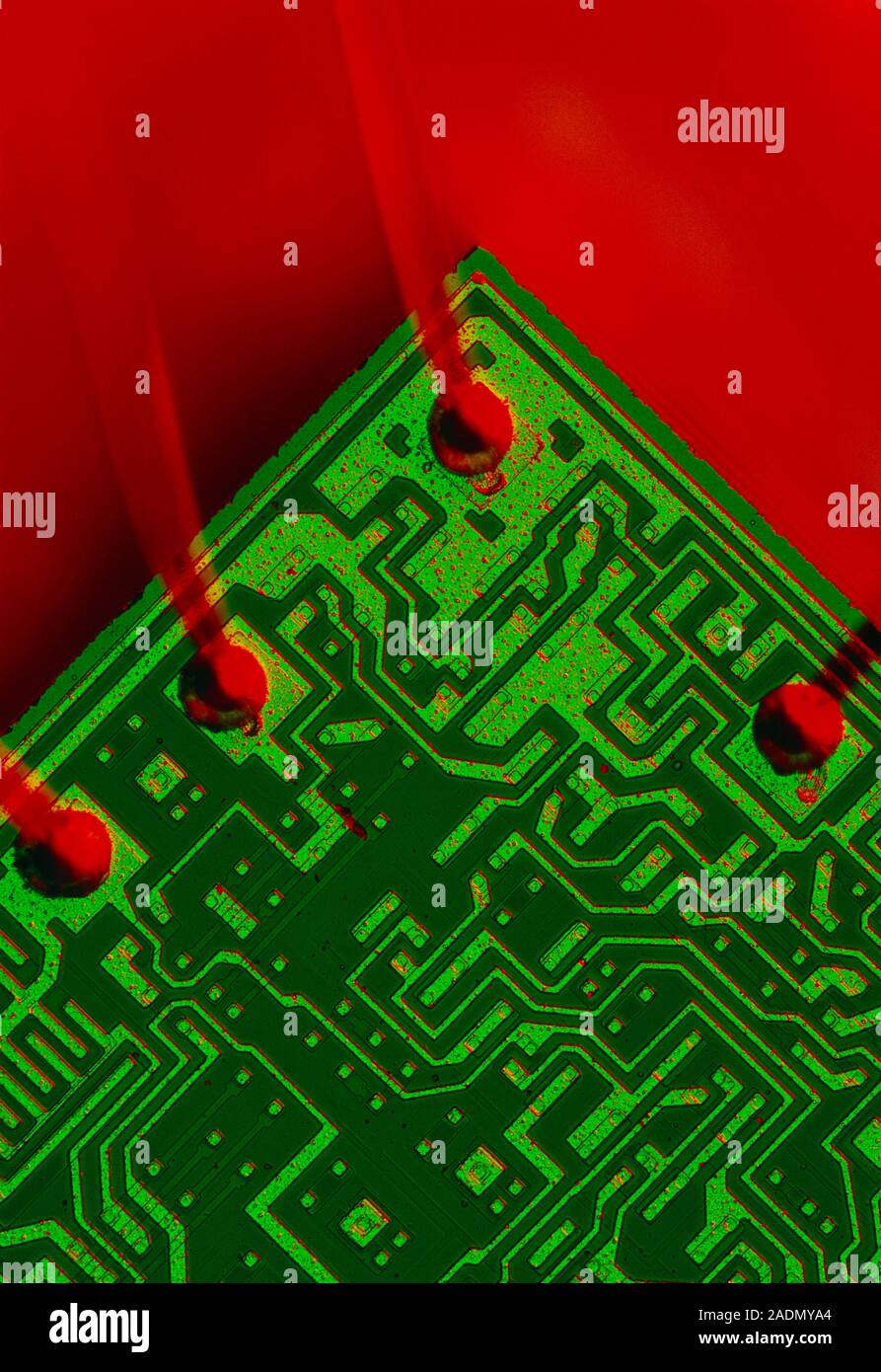 Light micrograph of a part of a hybrid integrated circuit, showing ...