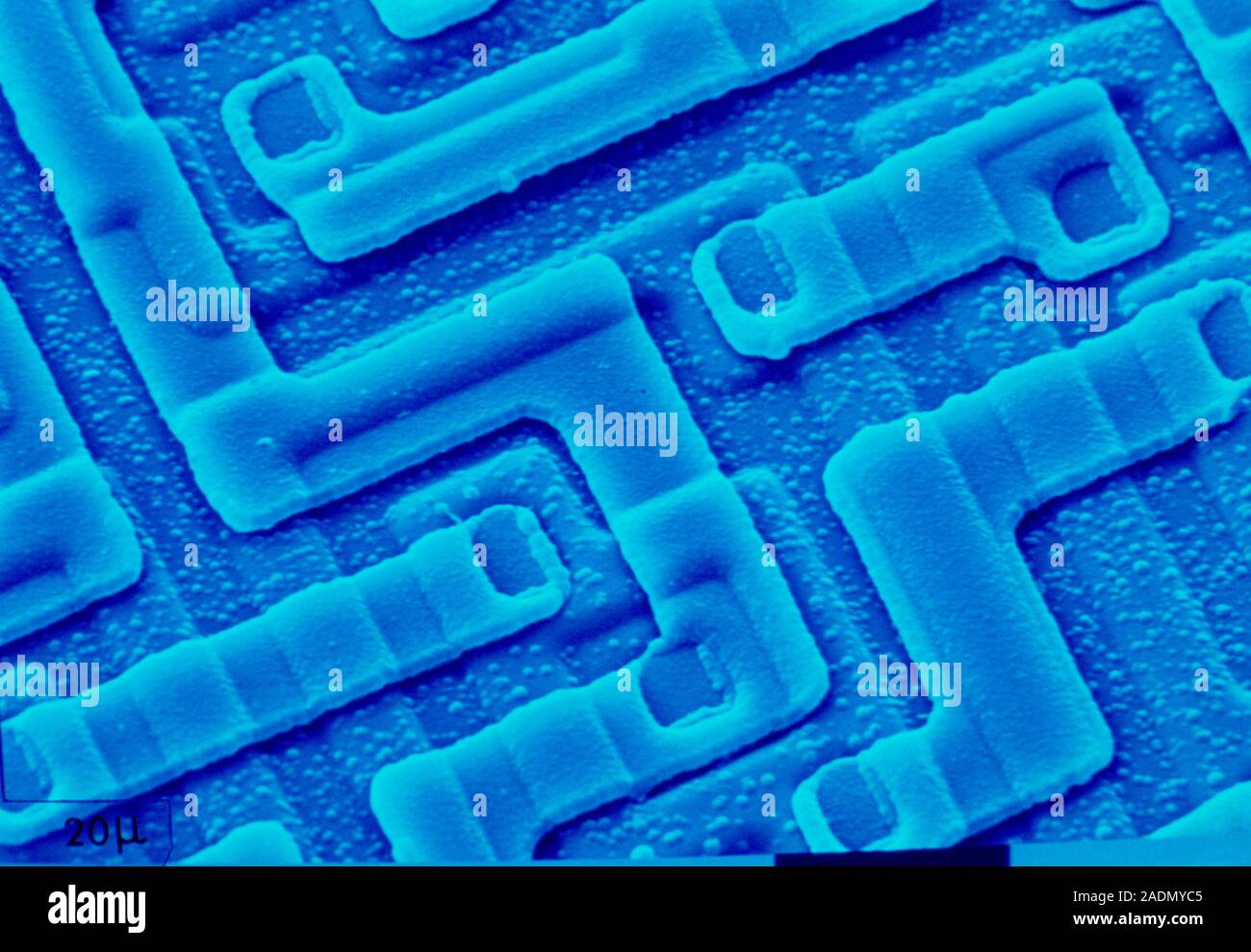 Scanning electron micrograph of the surface of an integrated circuit ...