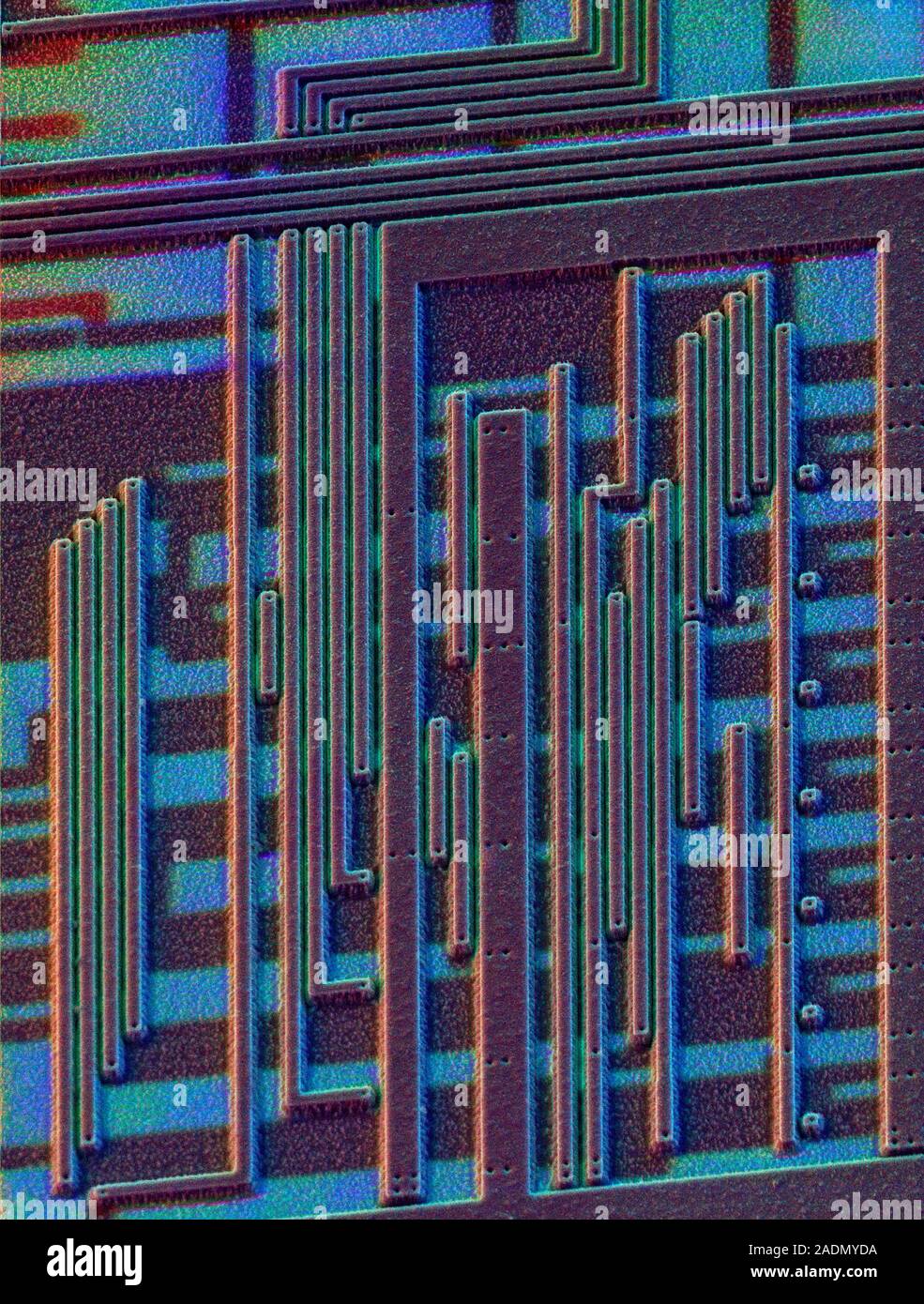 Integrated chip. Coloured Scanning Electron Micro- graph (SEM) of the ...