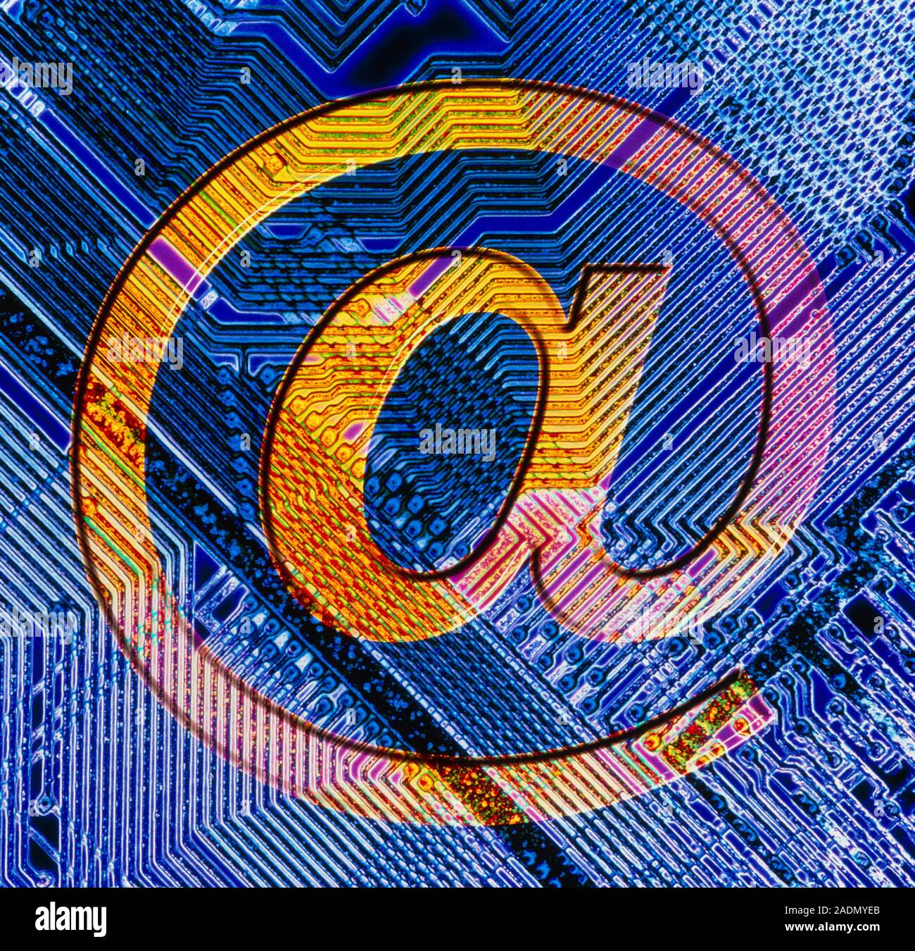 Internet symbol on a chip. Computer artwork of the symbol @" (at ...