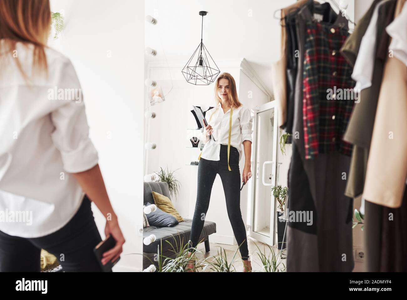 New work day has come. The process of fitting the dress in the studio ...