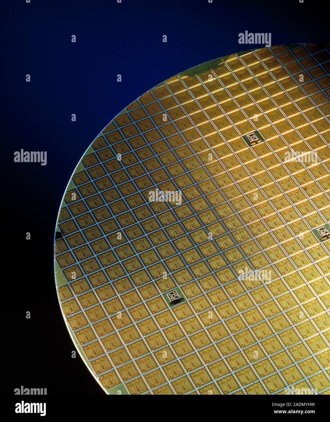 Silicon wafer and chips. Processed silicon wafer. The wafer contains ...