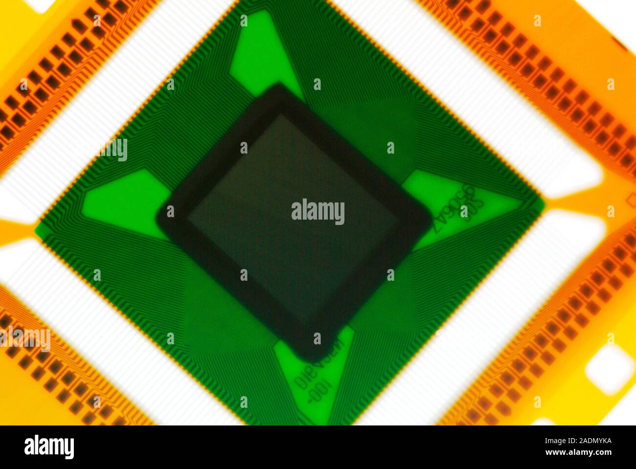 Computer microchip. Close-up of the surface of a microchip, a piece of ...