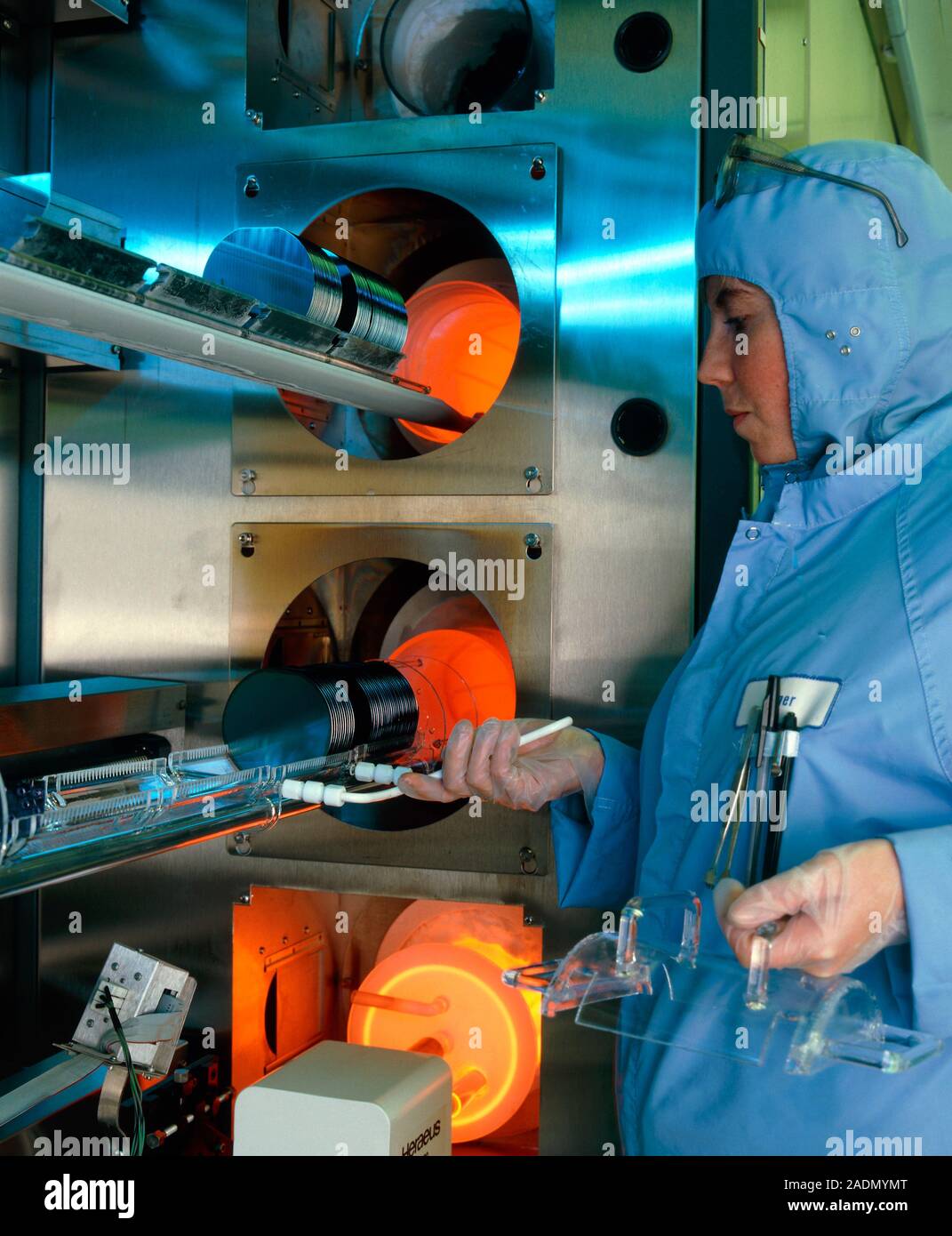 Loading of silicon wafers into an automatic high temperature furnace ...