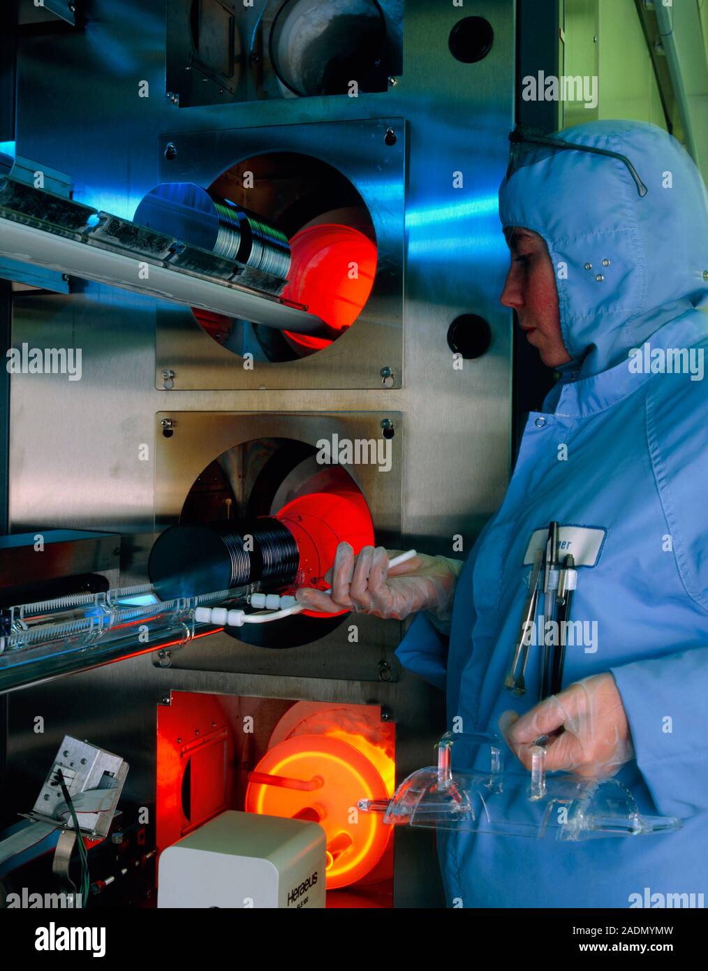 Loading of silicon wafers into an automatic high temperature furnace ...