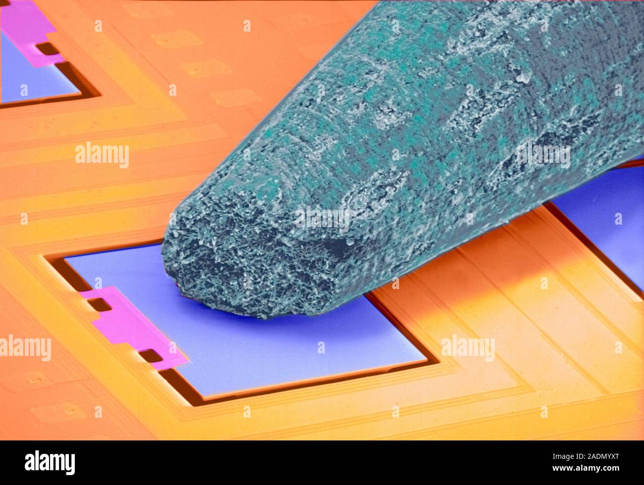 Car air bag sensor. Coloured scanning electron micrograph (SEM) of the ...