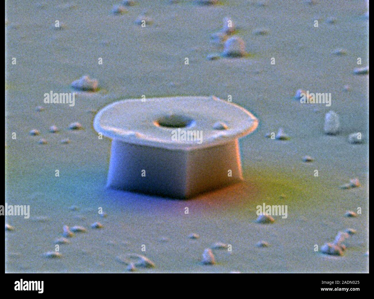 Nano-laser. Coloured scanning electron micrograph (SEM) of a nano-laser ...