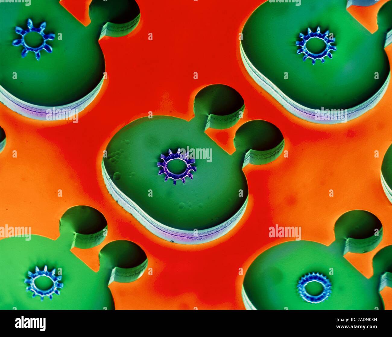 Micro-engine. Coloured scanning electron micro- graph (SEM) of ...