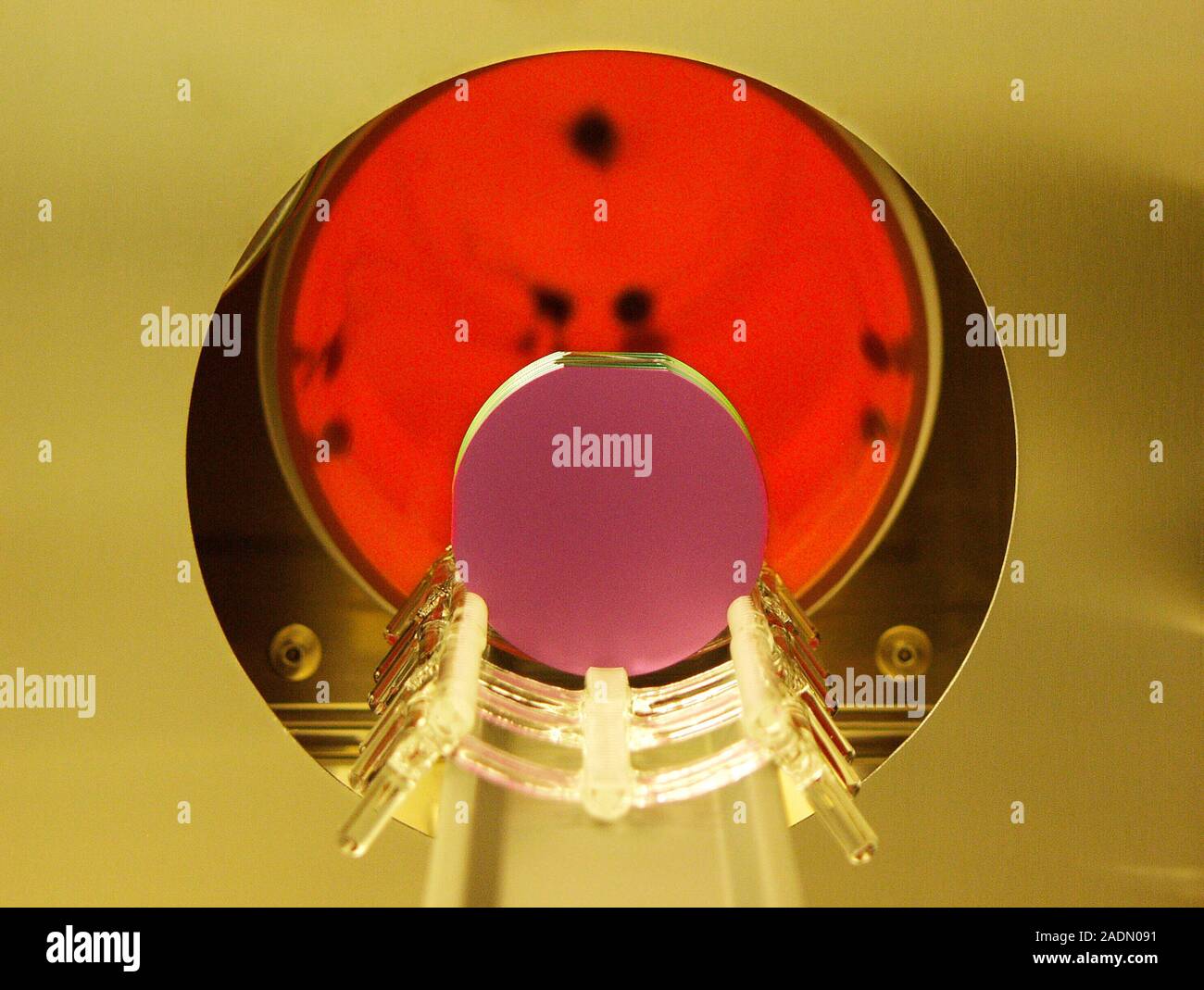 MEMS production. Silicon plate emerging from a furnace as part of the ...