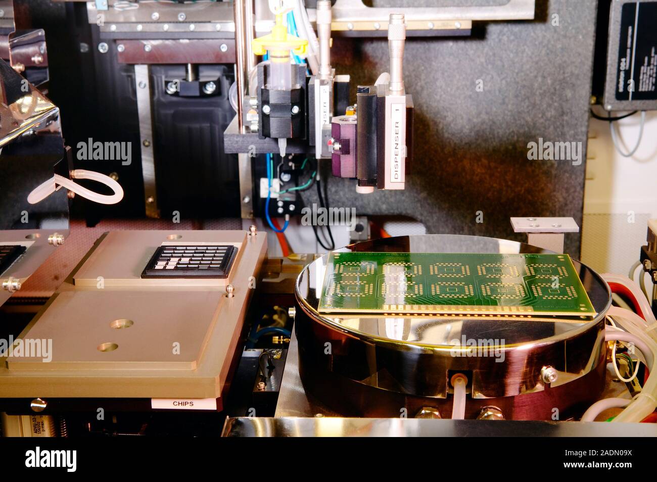 MEMS production. Flip chip bonding apparatus (lower right) being used ...