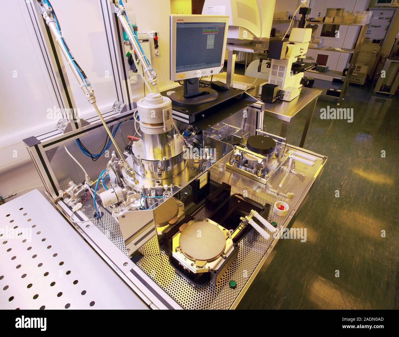 MEMS production. Hot embossing machine being used to produce MEMS ...