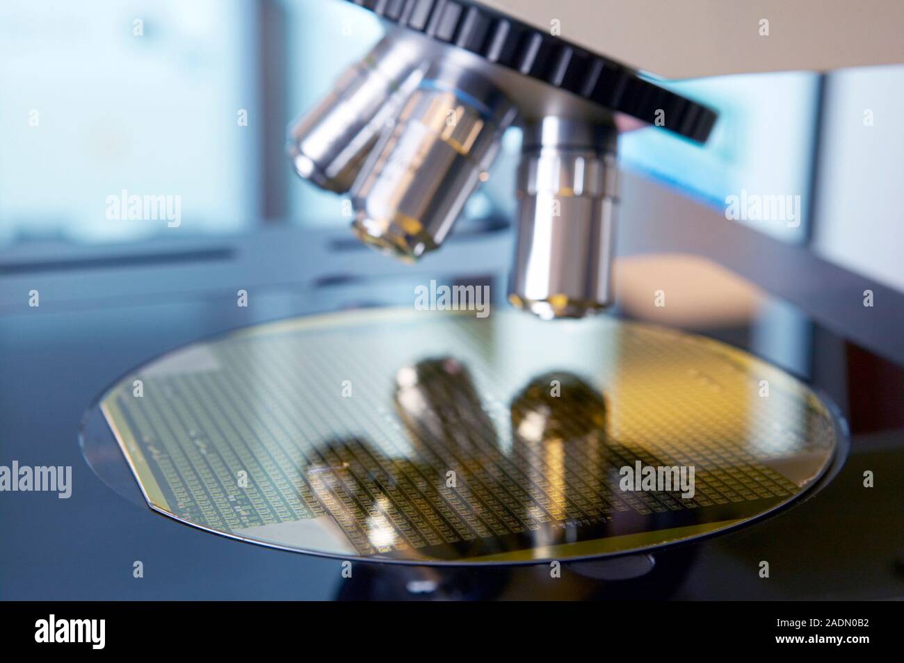 MEMS production. Microscope being used to carry out quality control ...