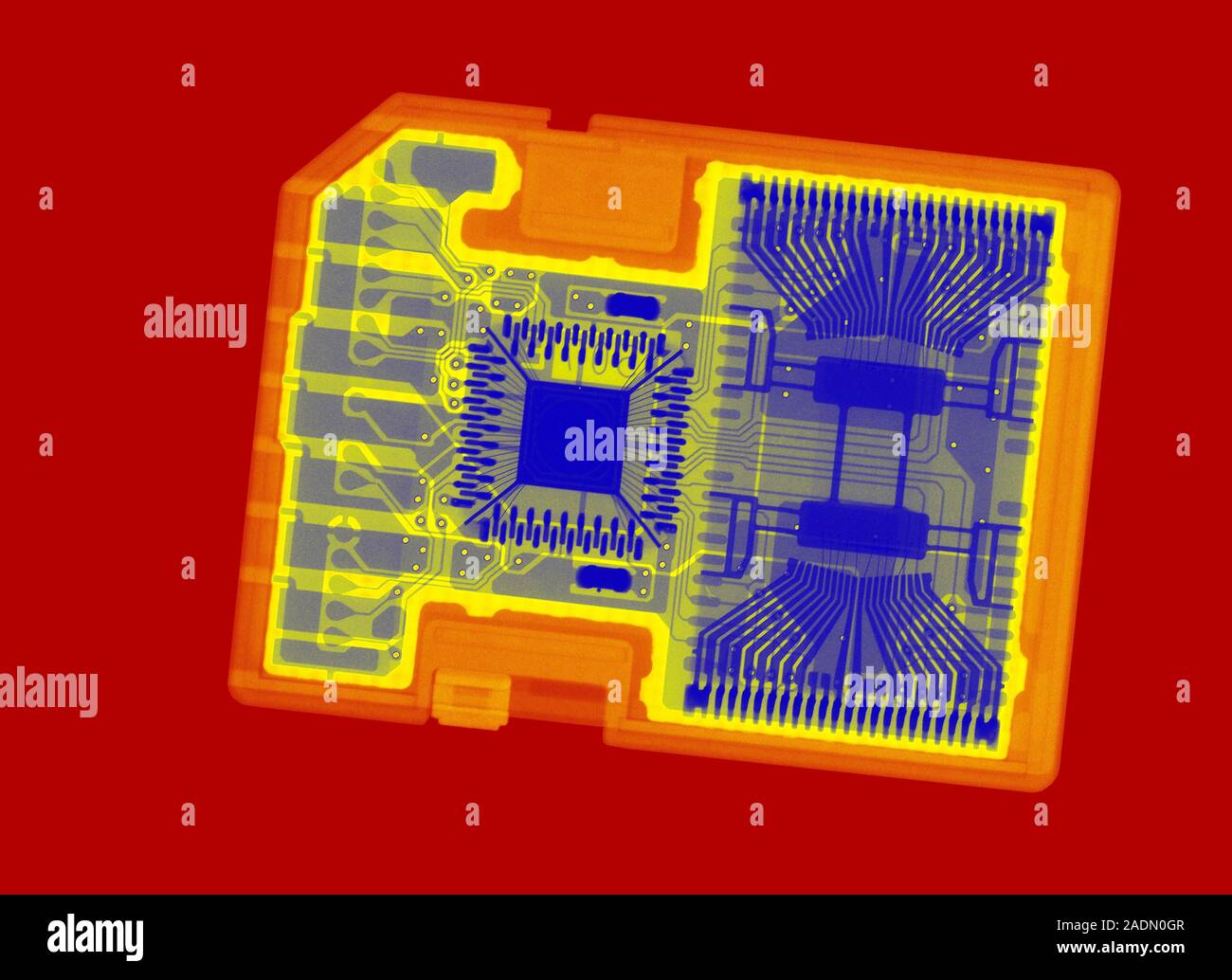 Games console memory card, coloured X-ray Stock Photo - Alamy