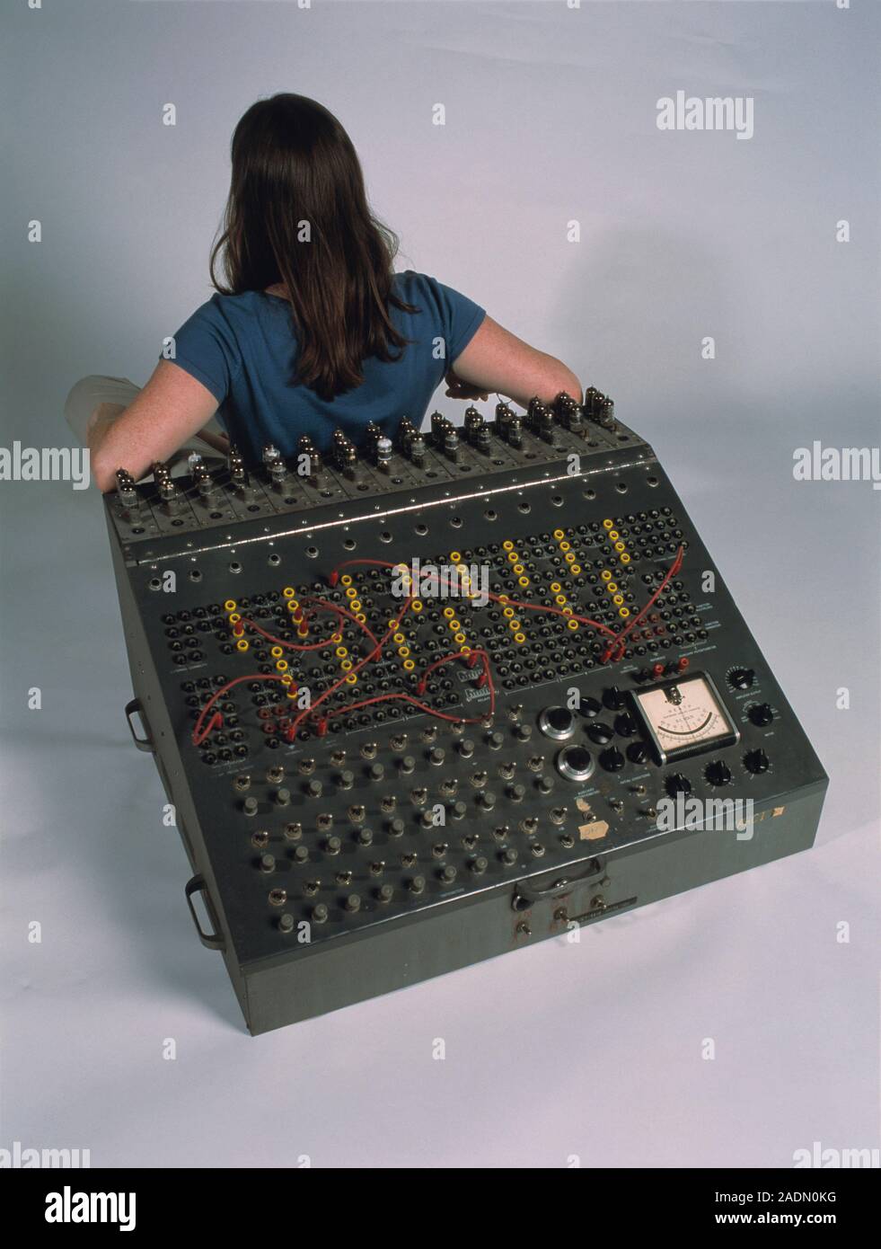 Heathkit H-1 home-build computer, with a person sitting behind it, on ...