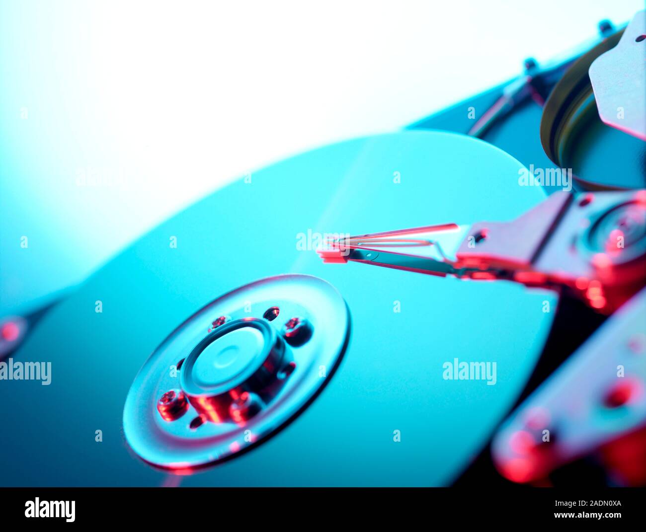 Hard disc from a computer. It consists of a read- write head (centre ...