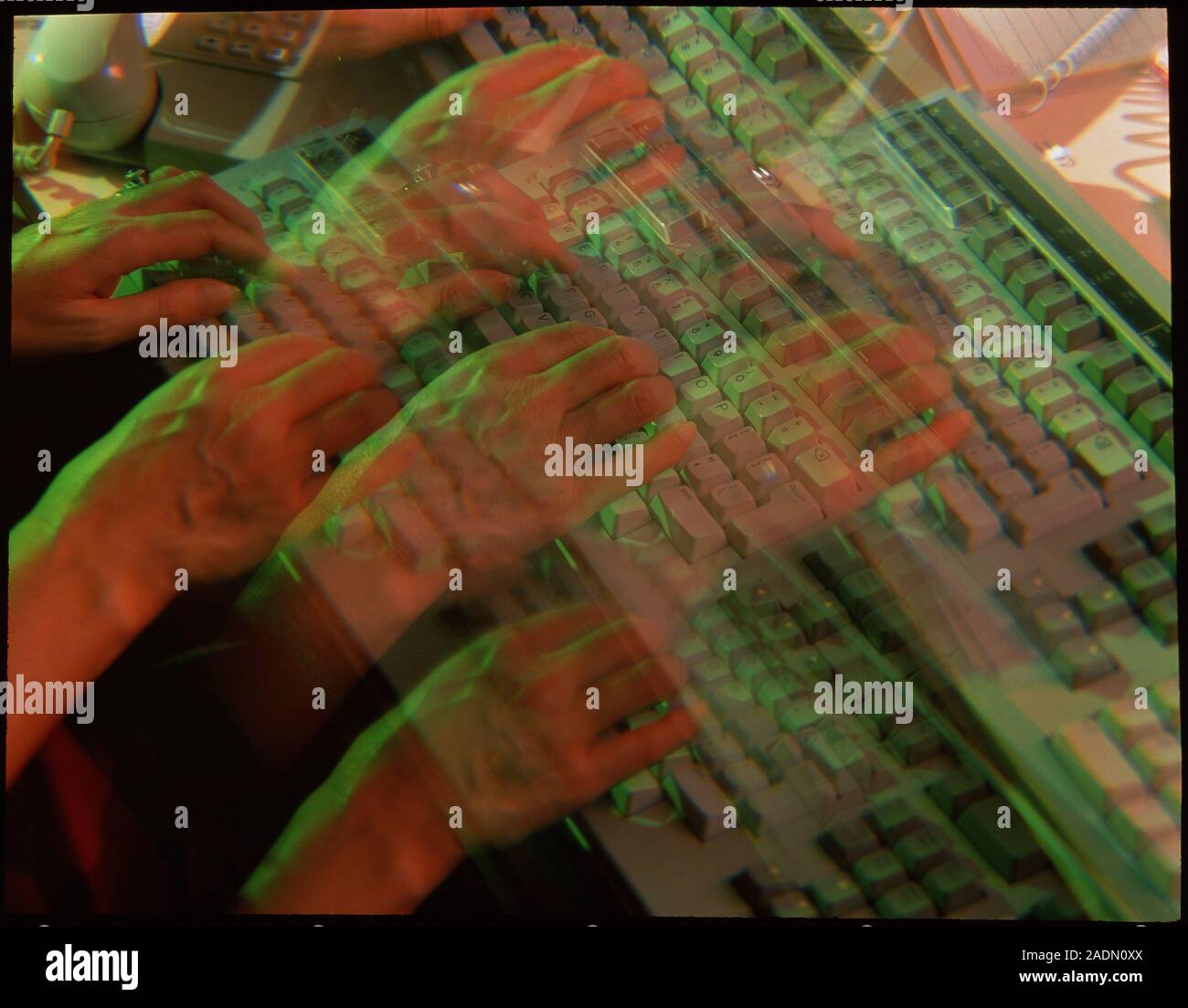 Hands on computer keyboard Stock Photo - Alamy