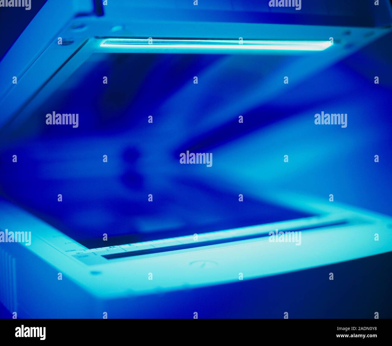 Flatbed image scanner. View of a desktop flatbed scanner with its lid ...