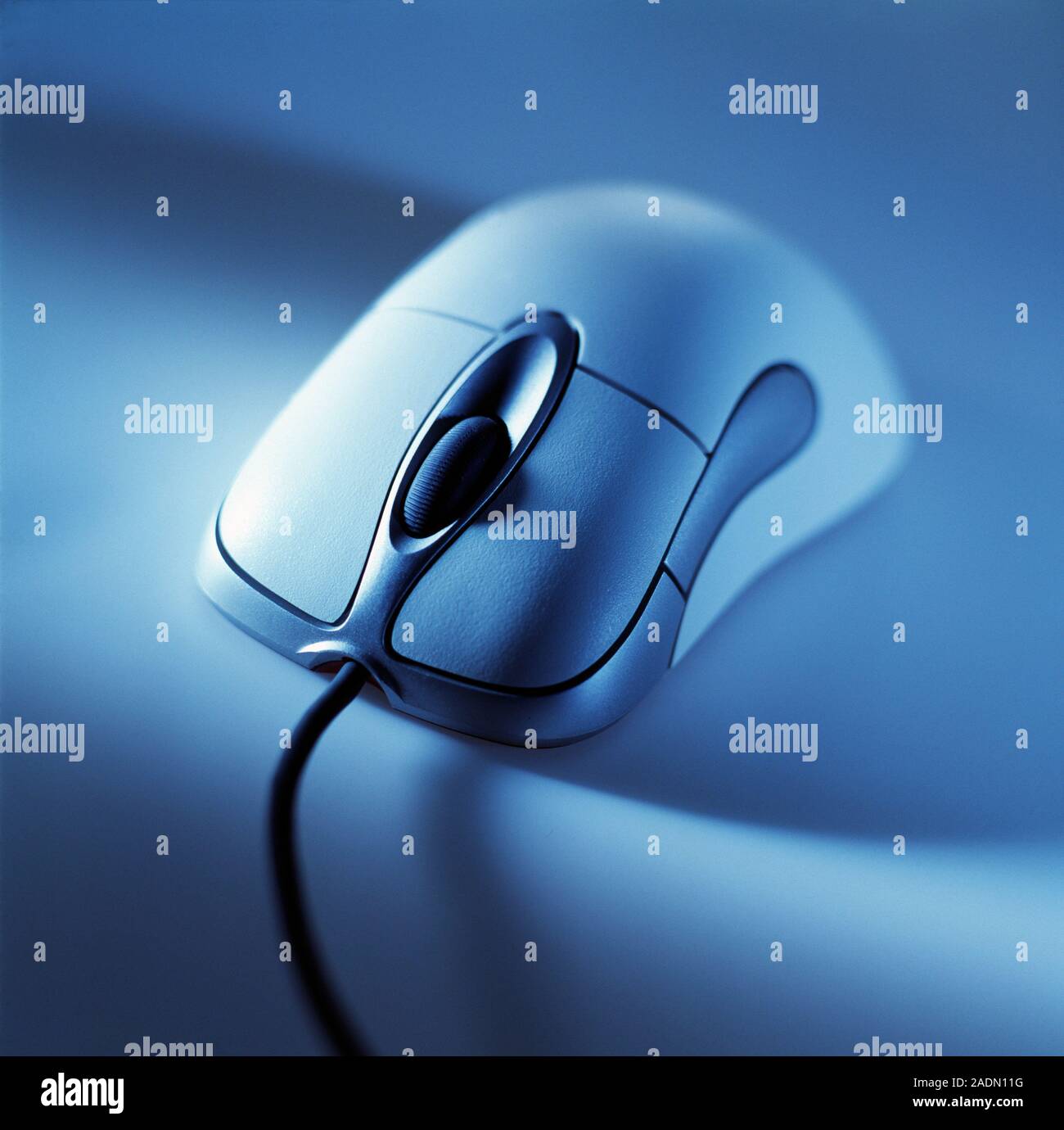 Computer mouse with a scroll wheel. Sensors on the inside of the mouse ...