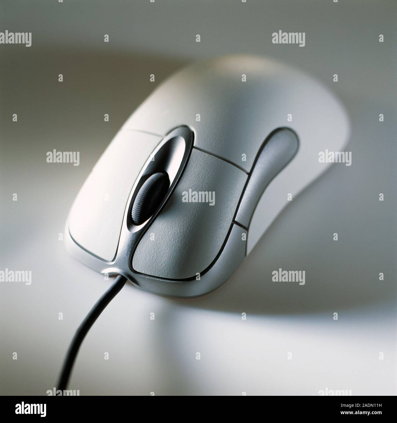 Computer mouse with a scroll wheel. Sensors on the inside of the mouse ...