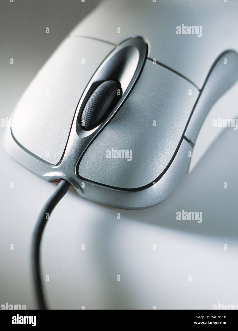 Computer mouse with a scroll wheel. Sensors on the inside of the mouse ...