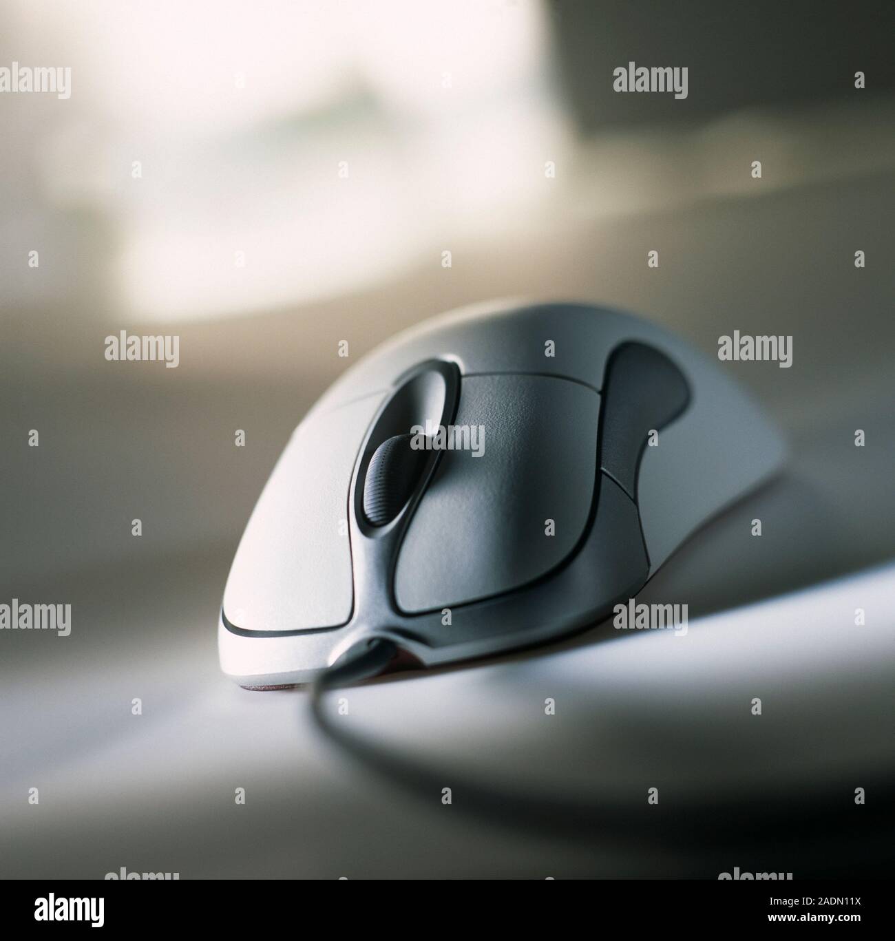 Computer mouse with a scroll wheel. Sensors on the inside of the mouse ...