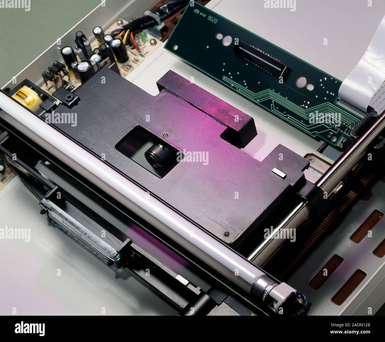 Scan head of a flatbed scanner. Flatbed or desktop scanners capture ...