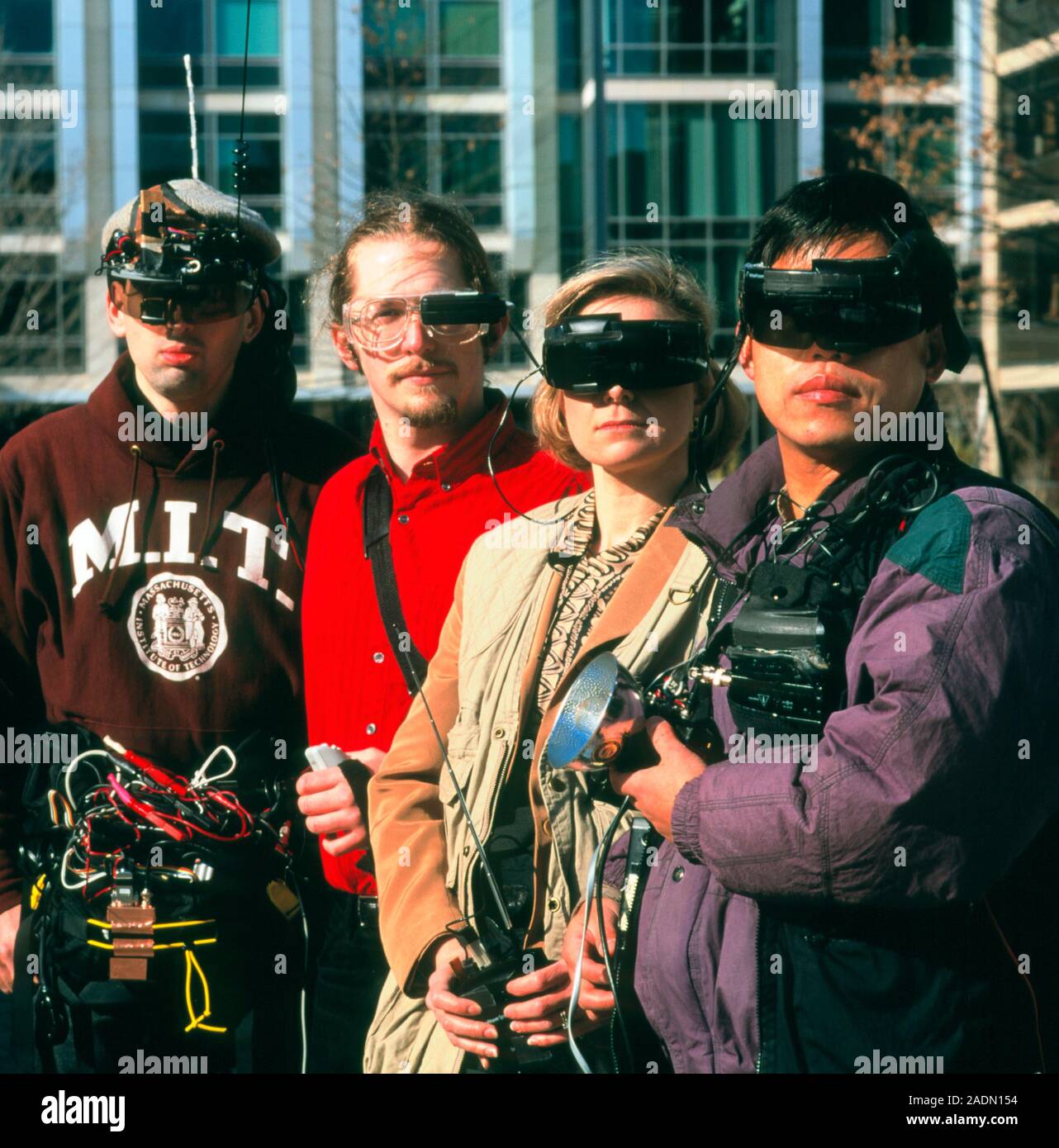 Computerised clothing. People with various designs of smart clothes ...